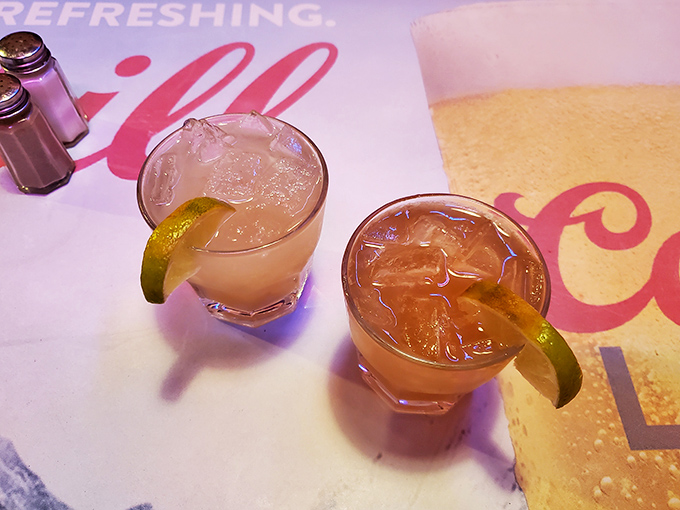 Two cocktails that say, "The ocean is right there, but vacation starts right here." Lime garnish included, worries not invited.