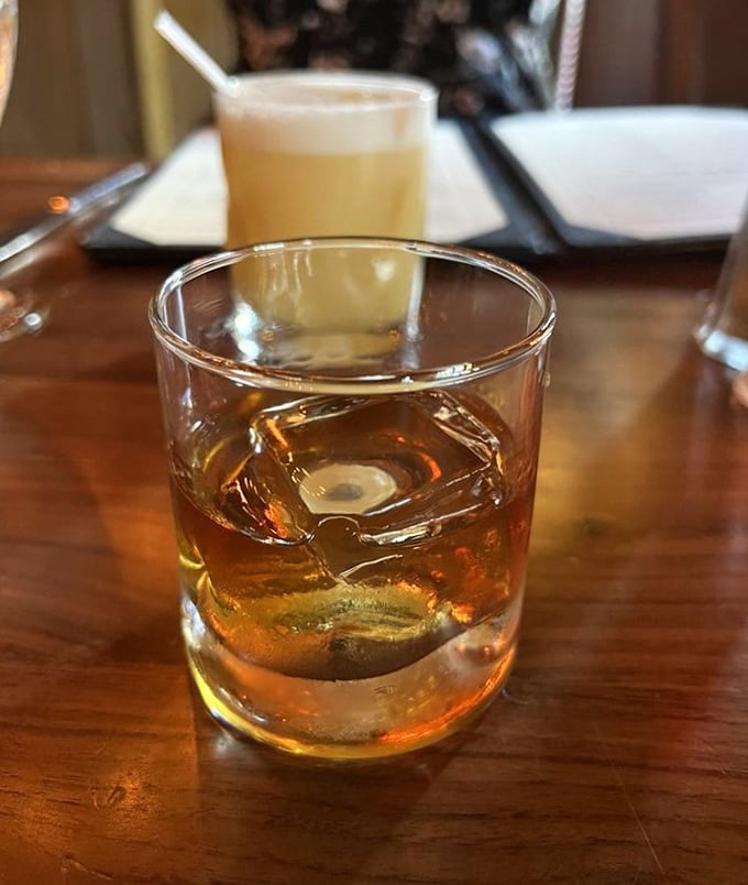 An Old Fashioned done right&mdash;amber liquid, one perfect ice cube, and the promise of relaxation in a glass.