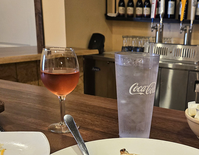 Every great Italian meal deserves proper hydration. One glass for courage, another for conversation, and water because we're responsible adults. Sometimes.
