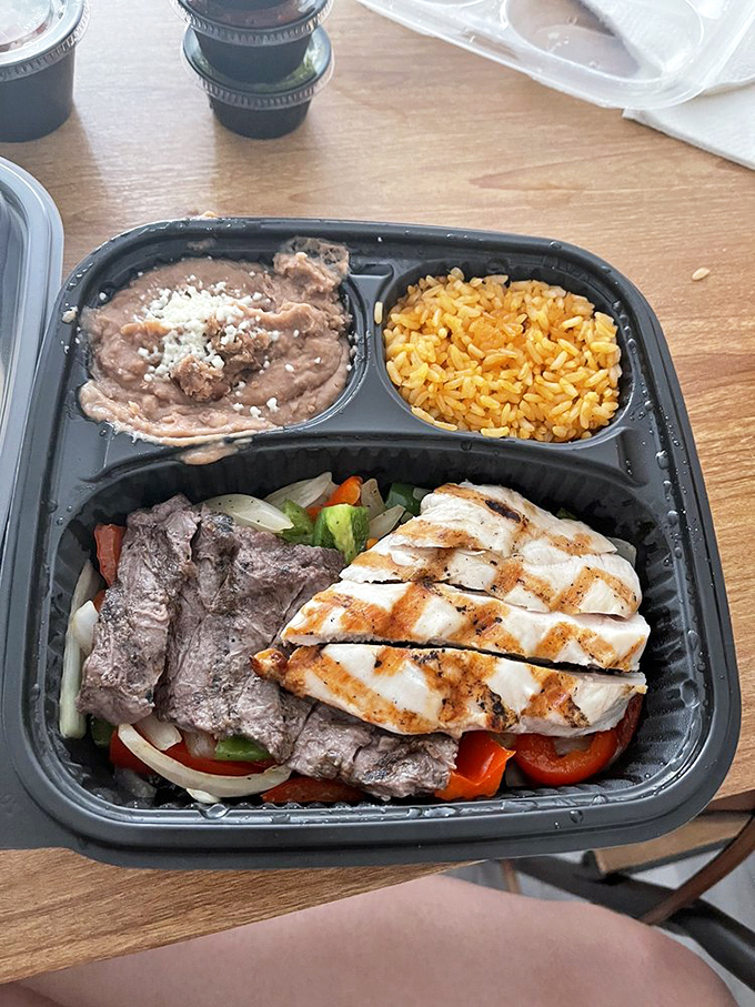 The fajita platter arrives with the sizzle of a Hollywood entrance. Protein and vegetables performing a perfectly choreographed flavor dance.