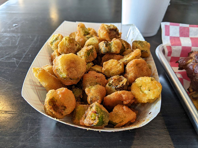 Fried okra: the South's answer to popcorn, with each golden nugget offering a crispy-tender bite that converts skeptics into believers.