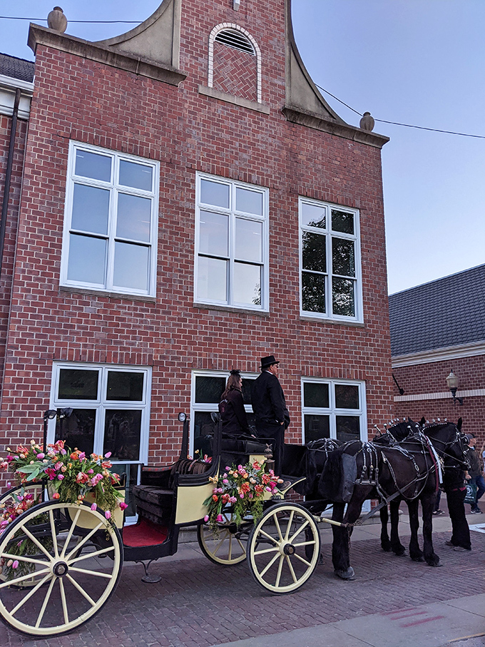 Not your average Uber—horse-drawn carriages complete with flower arrangements add old-world charm to Pella's authentic Dutch experience.