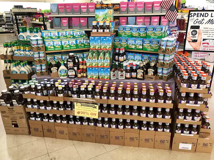 Liquid gold at golden prices – grocery essentials displayed with military precision, proving bargain shopping can be both organized and delicious.