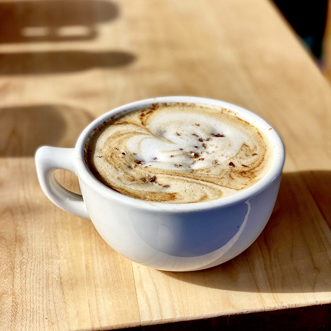 Coffee art so pretty you almost don't want to drink it. Almost. The key word being "almost."