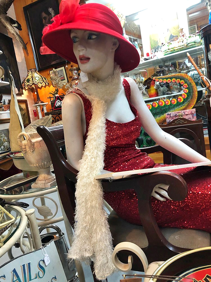 The glamorous flapper mannequin waits eternally for her jazz age soiree. That red sequined dress has stories that would make F. Scott Fitzgerald blush.