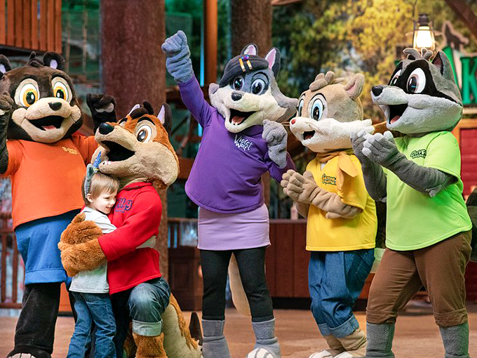 The Lodge's woodland mascots&mdash;ready to high-five your kids while you secretly calculate how much someone gets paid to wear fur suits in a humid environment.