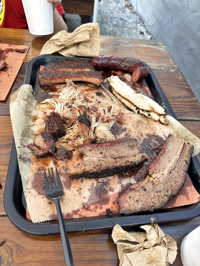 Barbecue platter or modern art? Both. This tray represents hours of patience and expertise that no microwave dinner could ever understand.