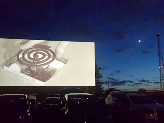 As dusk settles and the screen illuminates, that magical moment when everyday cars transform into personal cinema pods.