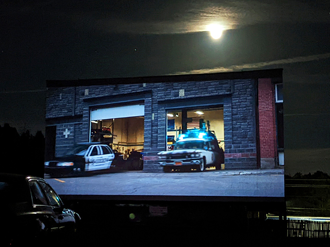 When darkness falls, the massive screen illuminates with larger-than-life stories while viewers settle in for the show.