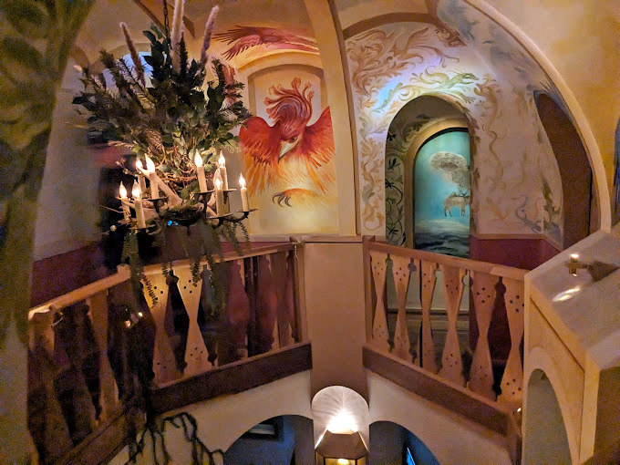 The staircase mural featuring a phoenix feels appropriate&mdash;this place has a way of resurrecting wonder you thought had died in childhood.
