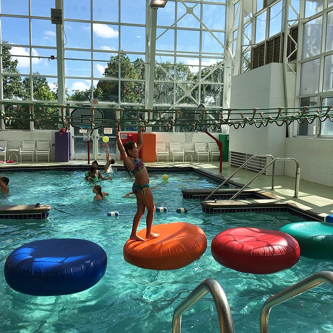 The floating obstacle course: where family vacation memories and mild humiliation intersect. That wobble when you almost make it across? Pure cinema.