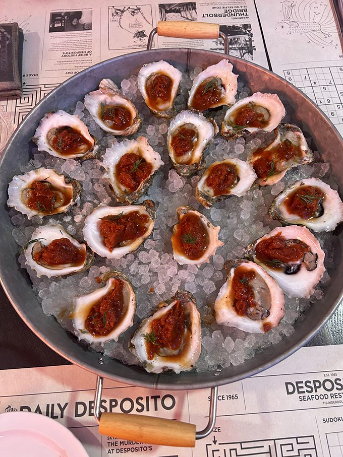Oysters on the half shell adorned with just the right amount of cocktail sauce&mdash;nature's perfect appetizer served on a bed of ice.