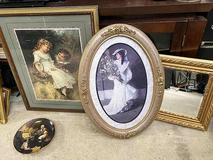 Framed memories seeking new walls to grace. Someone once loved these portraits enough to display them&mdash;perhaps you're next in their curious lineage.