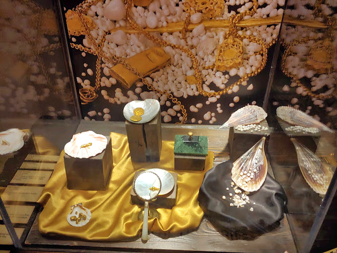 Nature's treasures rivaled gold for pirates. This stunning pearl display shows why merchants risked life and limb crossing pirate-infested waters.