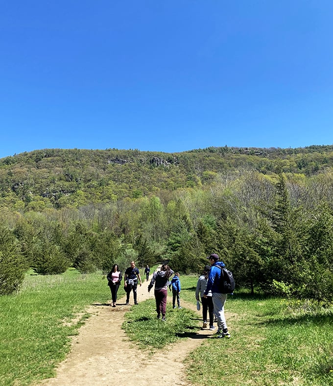 Fellow adventurers sampling the trail remind us that nature's best experiences are meant to be shared.