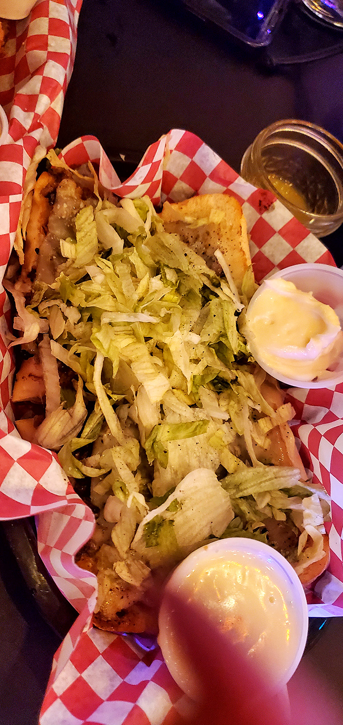 A sandwich so laden with cheese and toppings it threatens to collapse under its own ambition&mdash;thankfully your mouth arrives just in time.