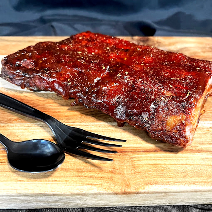 The chalkboard menu&mdash;barbecue's version of sacred text. Each chalked item represents hours of smoking dedication and generations of flavor wisdom.