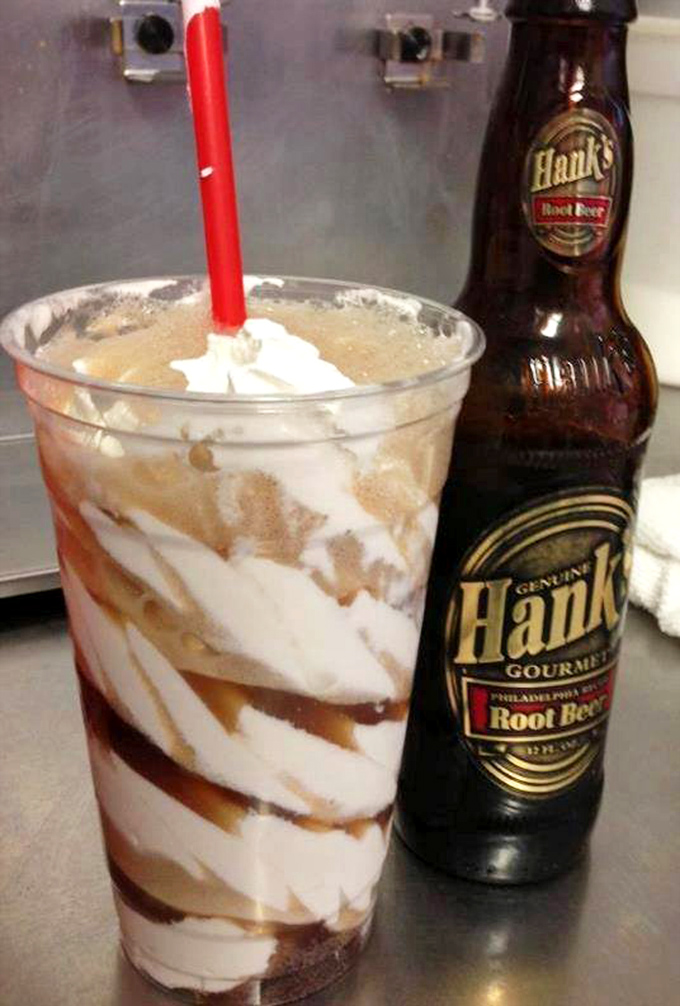Root beer float artistry at its finest. That swirl of vanilla ice cream meeting Hank's root beer creates a nostalgic symphony in a cup.