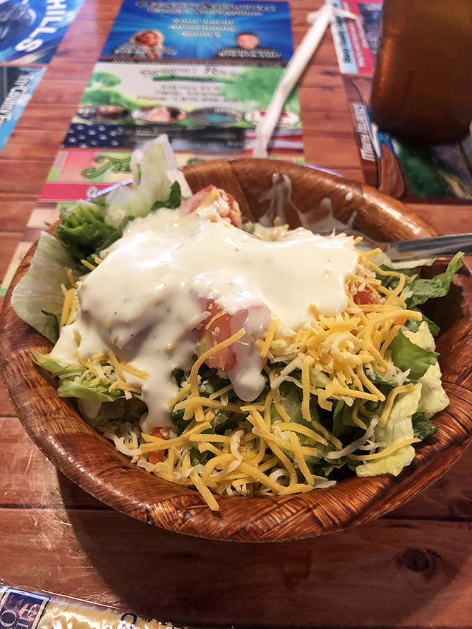 Even the salads at Swingle's come dressed for success. That wooden bowl has probably witnessed more Arkansas secrets than a small-town barber.