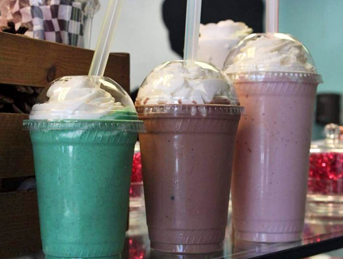 The milkshake trinity—three different flavors that prove drinking your ice cream isn't laziness, it's an alternative appreciation method.