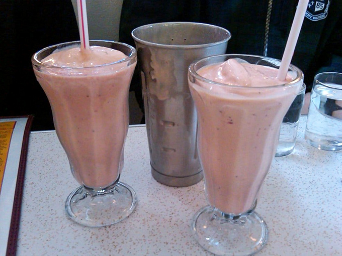 These milkshakes are so thick, the straws stand at attention. The metal mixing cup on the side says, "We're not finished with you yet."