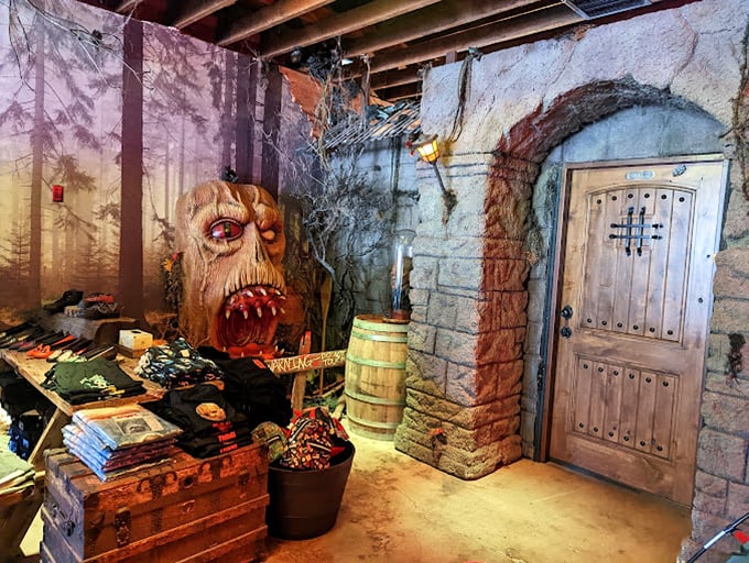 Gothic grandeur meets bohemian oddity under the warm glow of vintage chandeliers. Even the mannequin looks impressed by the collection. 