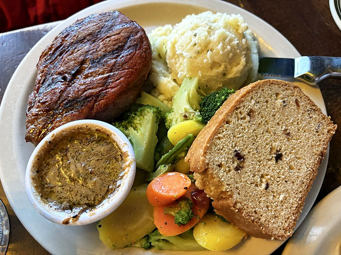 That steak isn't just cooked&mdash;it's been sweet-talked to perfection, with sides that know their supporting role in this meaty masterpiece.