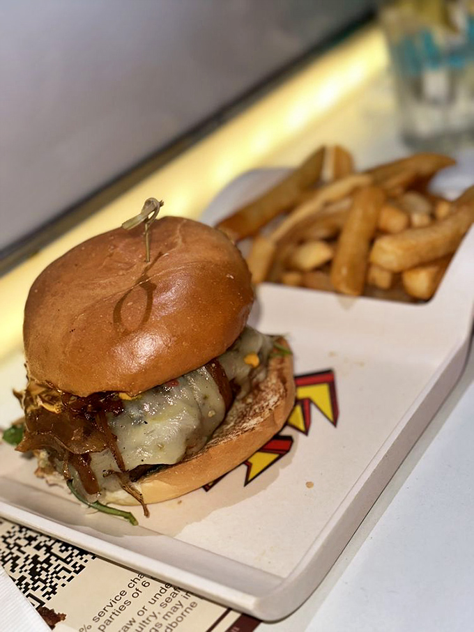This isn't just a burger&mdash;it's edible architecture. Layers of bacon, cheese, and beef stacked higher than the Hollywood sign.
