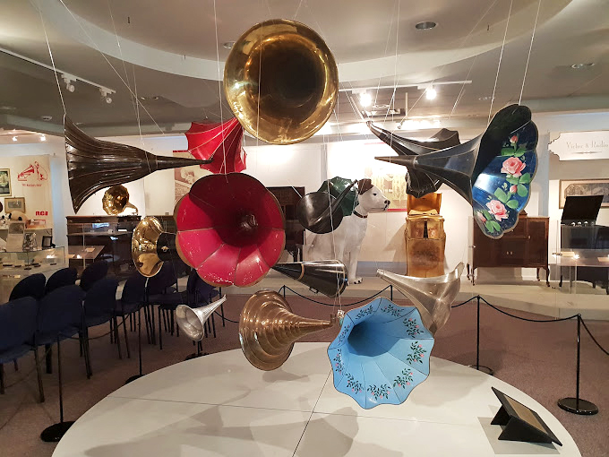 This whimsical installation of colorful horns seems to dance in mid-air, celebrating the rainbow of sounds that poured from these mechanical marvels.