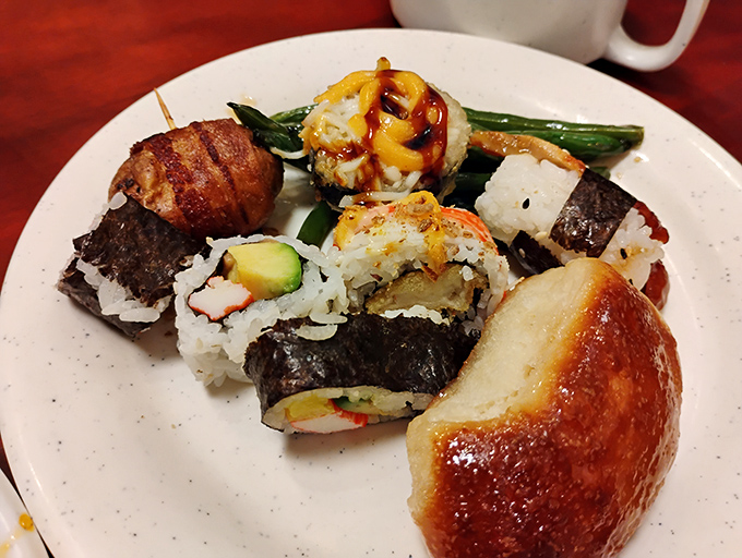 Sushi rolls nestled beside a golden dinner roll &ndash; proof that World Buffet understands the importance of diplomatic relations between cuisines. 