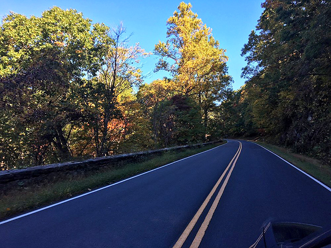 The view from behind the wheel&mdash;105 miles of perfectly engineered mountain road where every curve reveals another postcard-worthy moment.