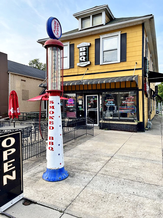 Combs BBQ Central's sunshine-yellow exterior is as cheerful as their food is delicious. That vintage BBQ sign isn't just decoration—it's a promise!