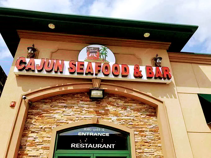 Crab Island Cajun: Behind that stone archway lies a Louisiana fever dream of spices, seafood, and absolutely zero restraint.