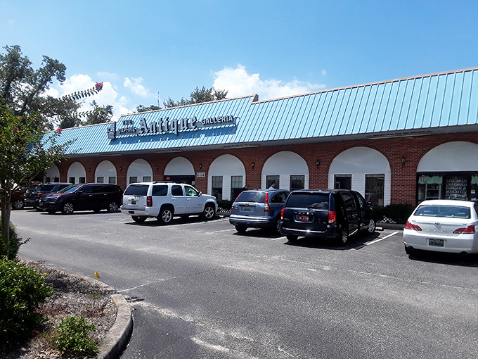 Daphne Antique Galleria's arched windows and brick facade exude Southern charm. Gulf Coast elegance with a side of history.