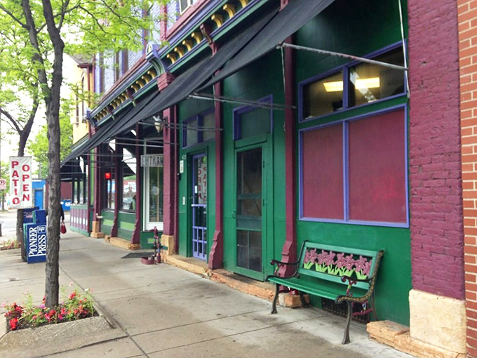 Green trim, colorful windows, and food that makes Monday mornings bearable - Day by Day Cafe is St. Paul's cheerful breakfast hero.