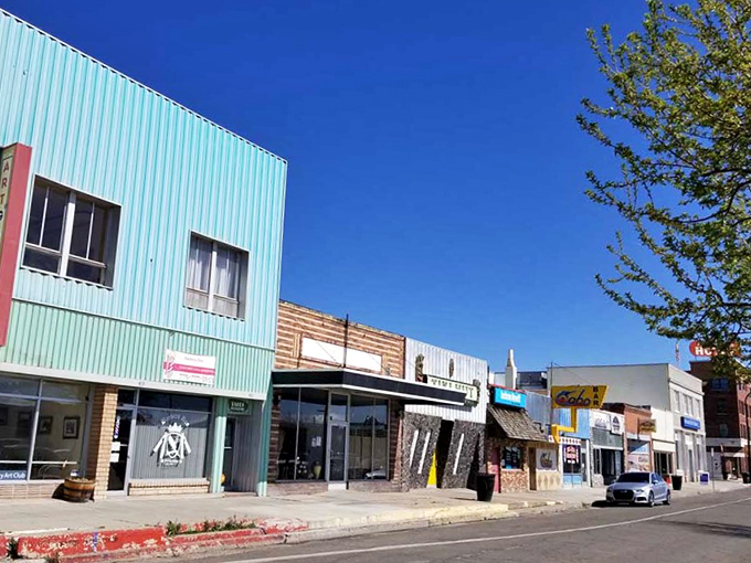 Elko's colorful downtown buildings house everything from vintage shops to modern businesses against that brilliant Nevada sky.