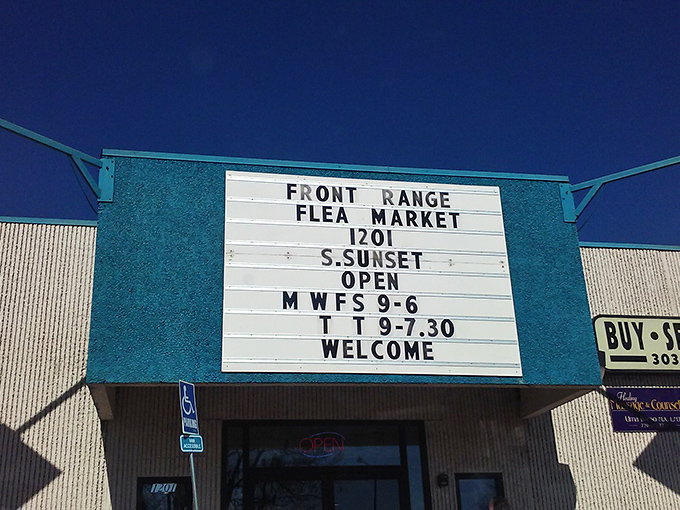 Front Range Mercantile's old-school marquee sign feels like a time machine invitation. "Open 9-6" means six full hours of treasure hunting!