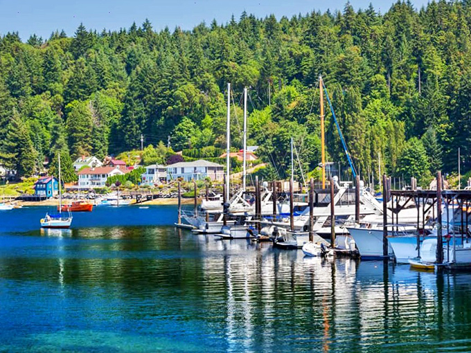 Boats bob gently in Gig Harbor's protected marina, promising peaceful mornings watching the water from your retirement deck.