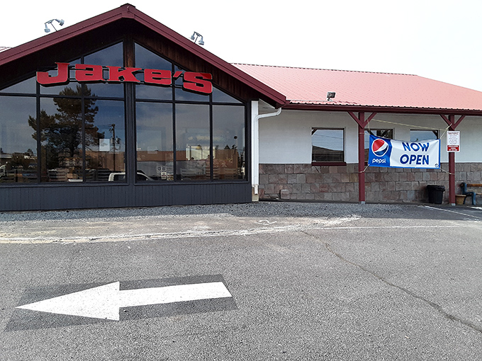 Jake's distinctive red roof signals breakfast paradise ahead &ndash; architectural proof that hunger emergencies will be handled promptly.
