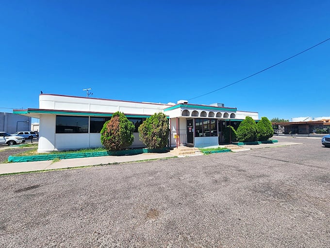 Mel's iconic teal coffee cup sign has guided hungry Phoenicians to breakfast bliss for generations.