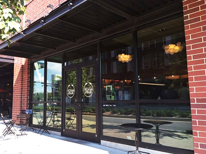 Large windows pour sunshine onto Willa Jean's sleek interior—breakfast with a side of vitamin D.