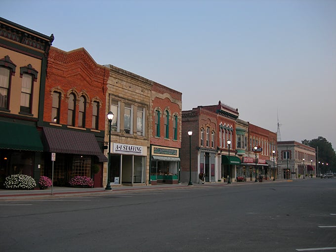 Winterset's classic brick storefronts frame a quintessential Midwestern town square where Norman Rockwell would feel right at home.