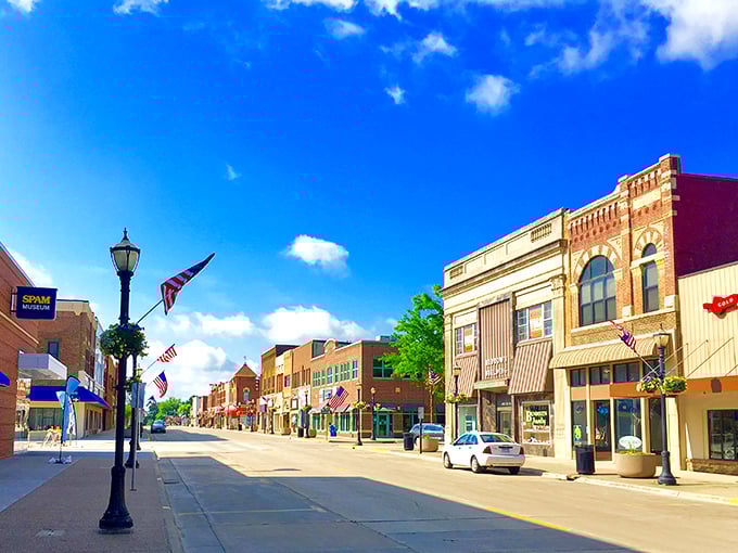 Downtown Austin's historic storefronts welcome visitors with Midwestern hospitality. No pretension here&mdash;just genuine small-town charm.
