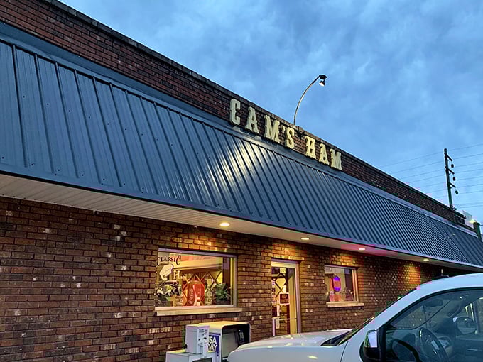 As dusk settles, Cam's Ham glows like a beacon for those seeking thin-sliced heaven on a bun—no reservation required.