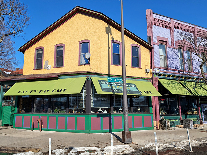 The Day by Day Cafe's vibrant exterior is like their food - unexpectedly colorful, delightfully approachable, and worth crossing town for.