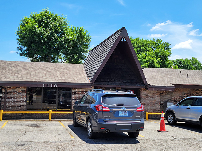 The A-frame entrance to Feltner's stands ready to welcome you to burger paradise—no passport required.
