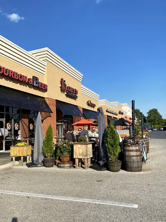 Bourbon barrels outside hint at Kloby's perfect pairing philosophy: great whiskey deserves great barbecue, and vice versa.