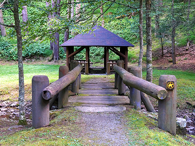 The rustic wooden bridge at Lost River guides visitors through a forest that feels untouched by time.