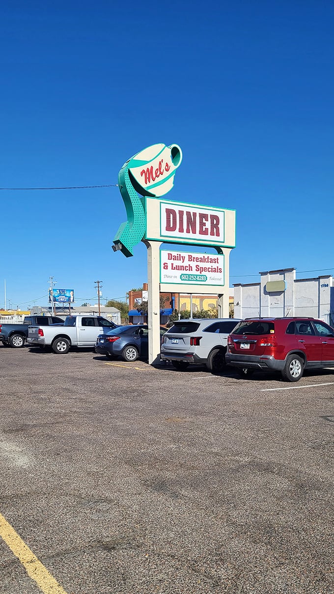 The unassuming exterior of Mel's Diner hides a breakfast institution where coffee cups are always full and portions never disappoint.