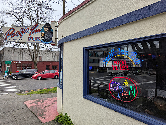 That vintage sign promises "Fine Draughts & Food" – a classic understatement for what might be Seattle's perfect neighborhood pub.
